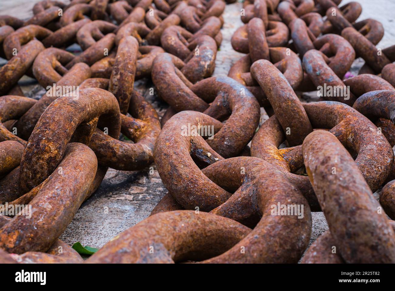 Old rusty ship's chain on the pier, close-up, selective focus. Idea for ...