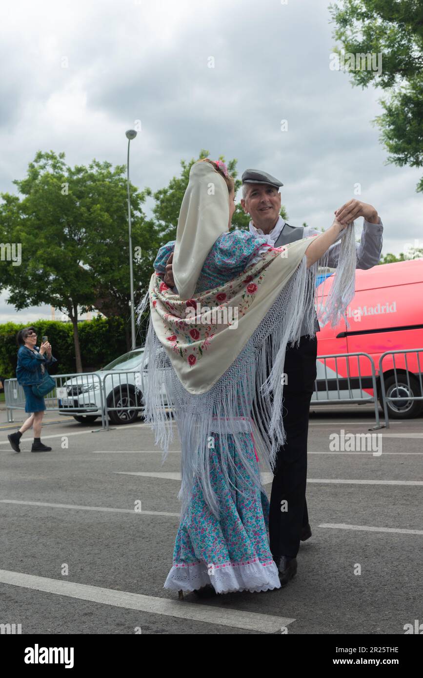 Madrid, Spain; May 14, 2023: Adult couple dancing chotis and pasodobles ...