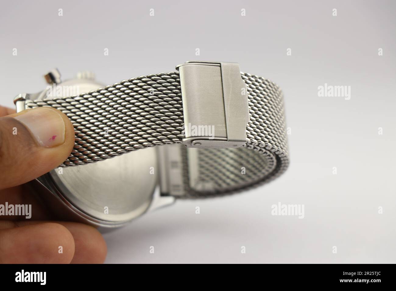 Watch strap made from stainless steel links that are adjustable and ...