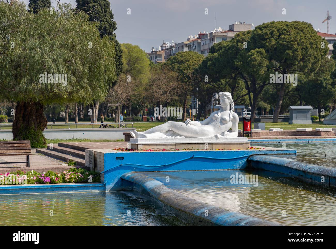 A picture of the Reclining Woman Sculpture next to the Cascade Pool of ...