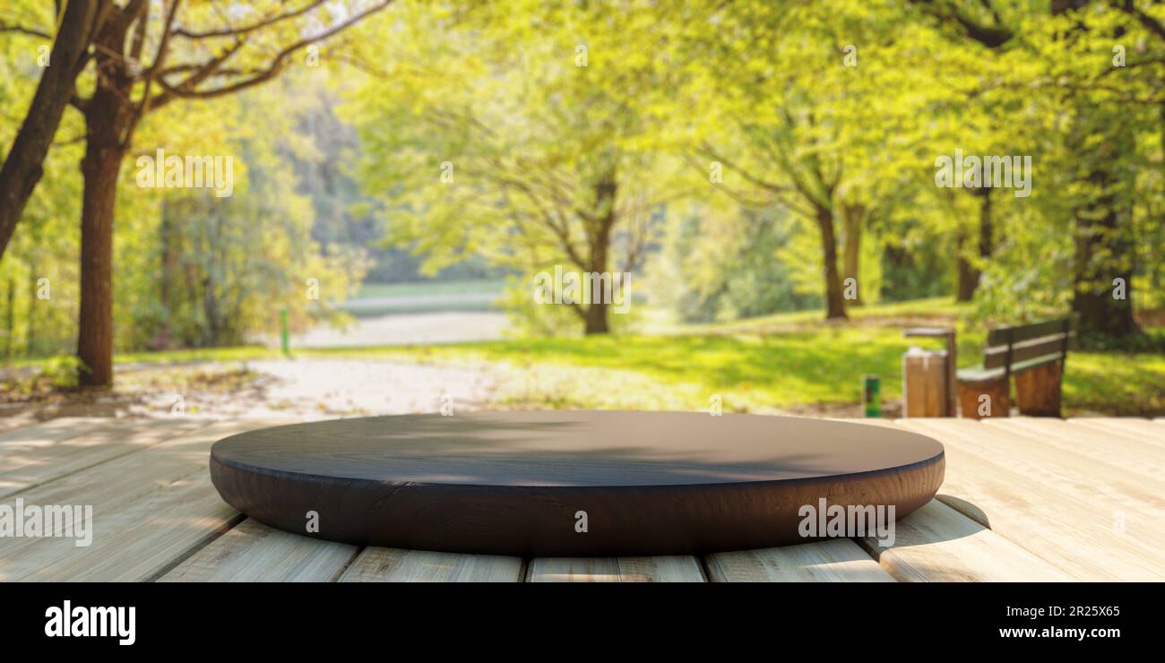 Empty wooden table outdoors, blur green park nature background, product ...