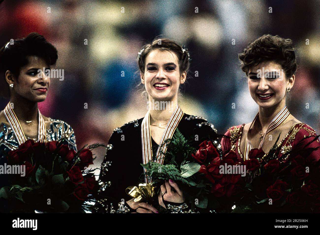 Katerina Witt (GDR) -C- wins the gold medal, with Debi Thomas (USA) -L ...