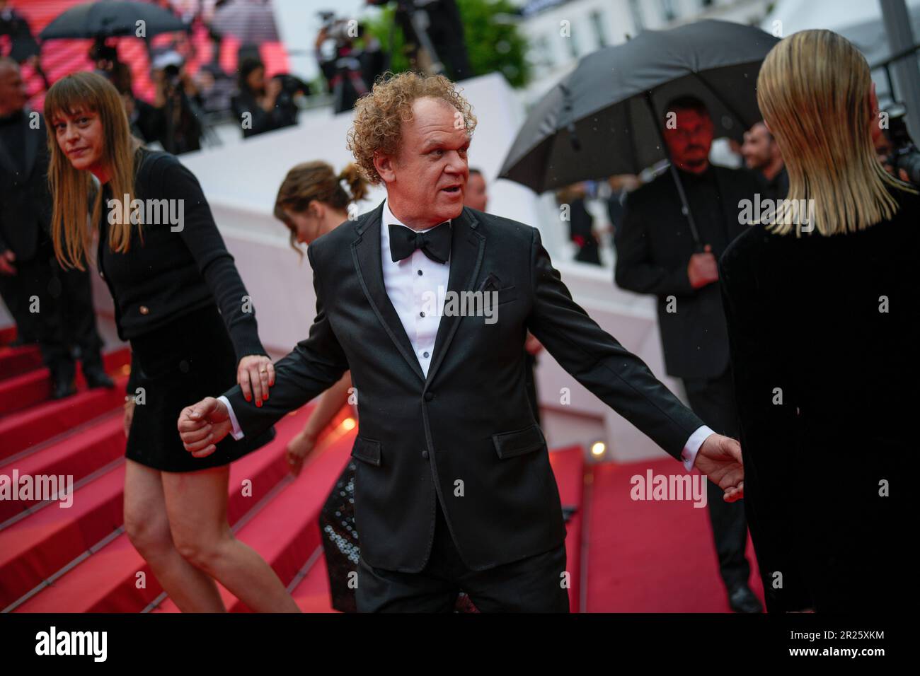 Alice Winocour, left, and John C. Reilly pose for photographers upon ...