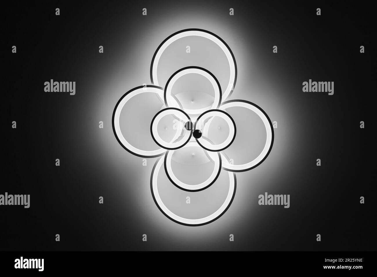 Luminous modern LED ring lamp on the ceiling. Bottom view Stock Photo ...