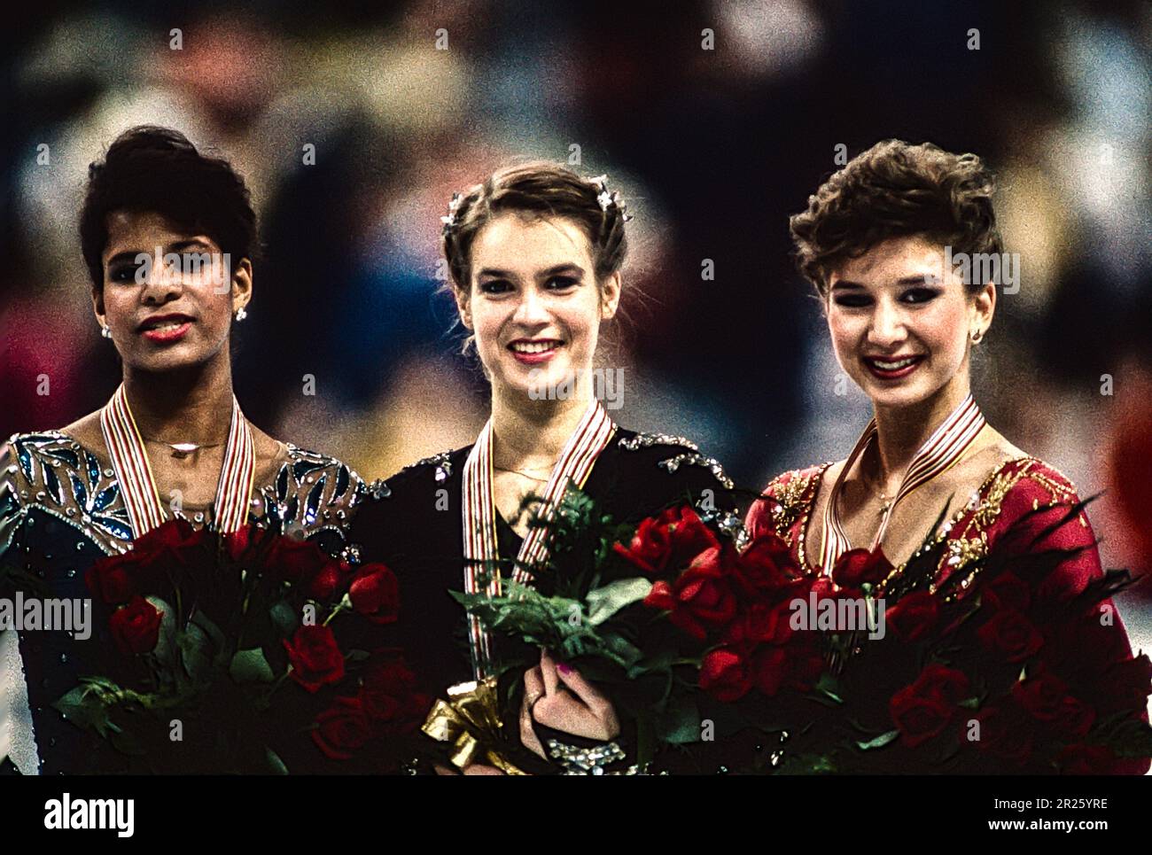 Katerina Witt (GDR) -C- wins the gold medal, with Debi Thomas (USA) -L ...