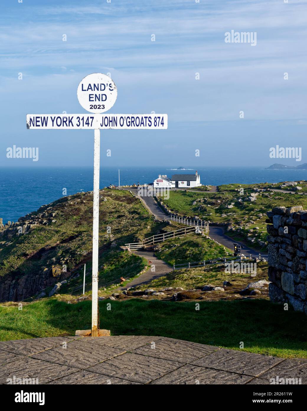Land's End Sign Post with First and Last House behind, Cornwall, UK ...