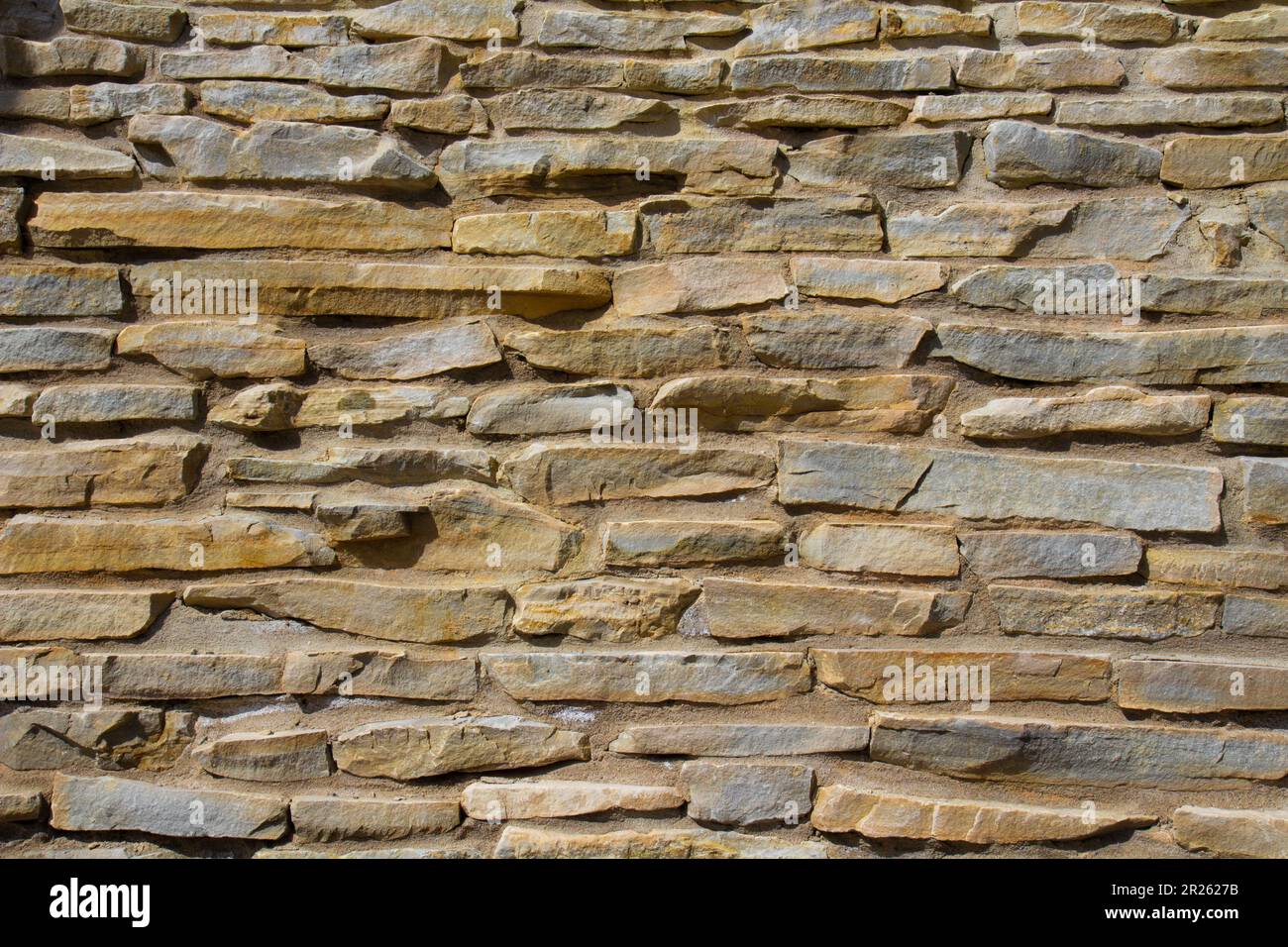 The stone wall texture background natural color. Background of stone ...