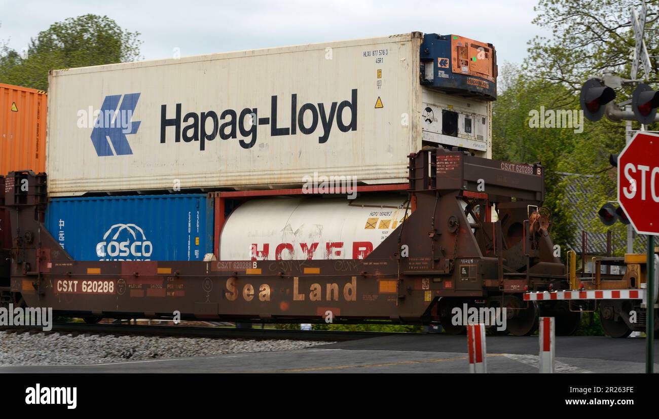 Shipping containers belonging to Hapag-Lloyd, a German shipping company ...