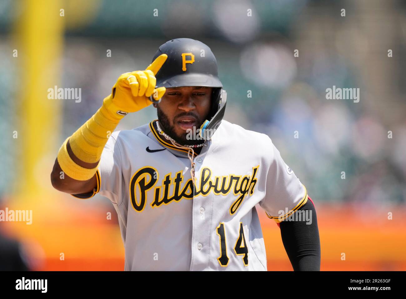 Pittsburgh Pirates' Rodolfo Castro points skyward after his solo home ...