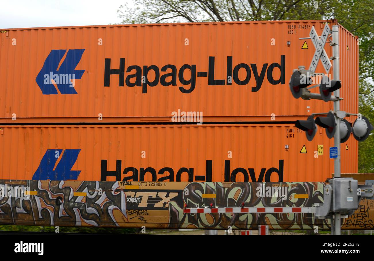 Shipping containers belonging to Hapag-Lloyd, a German shipping company, are among containers ...