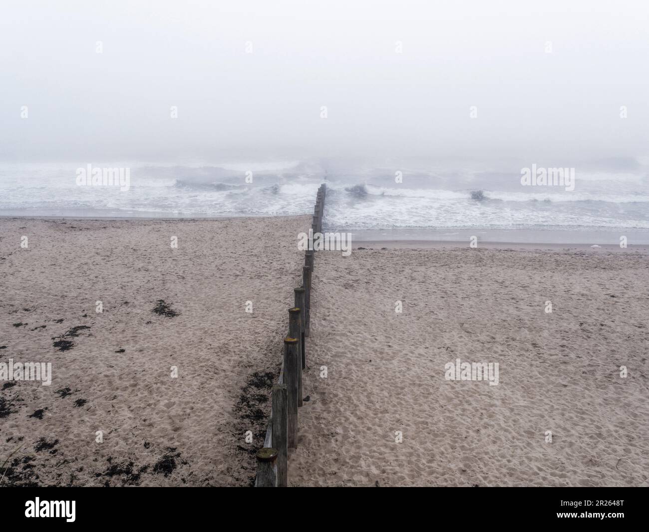 Wooden groynes to prevent sand drift and erosion at Blyth beach ...