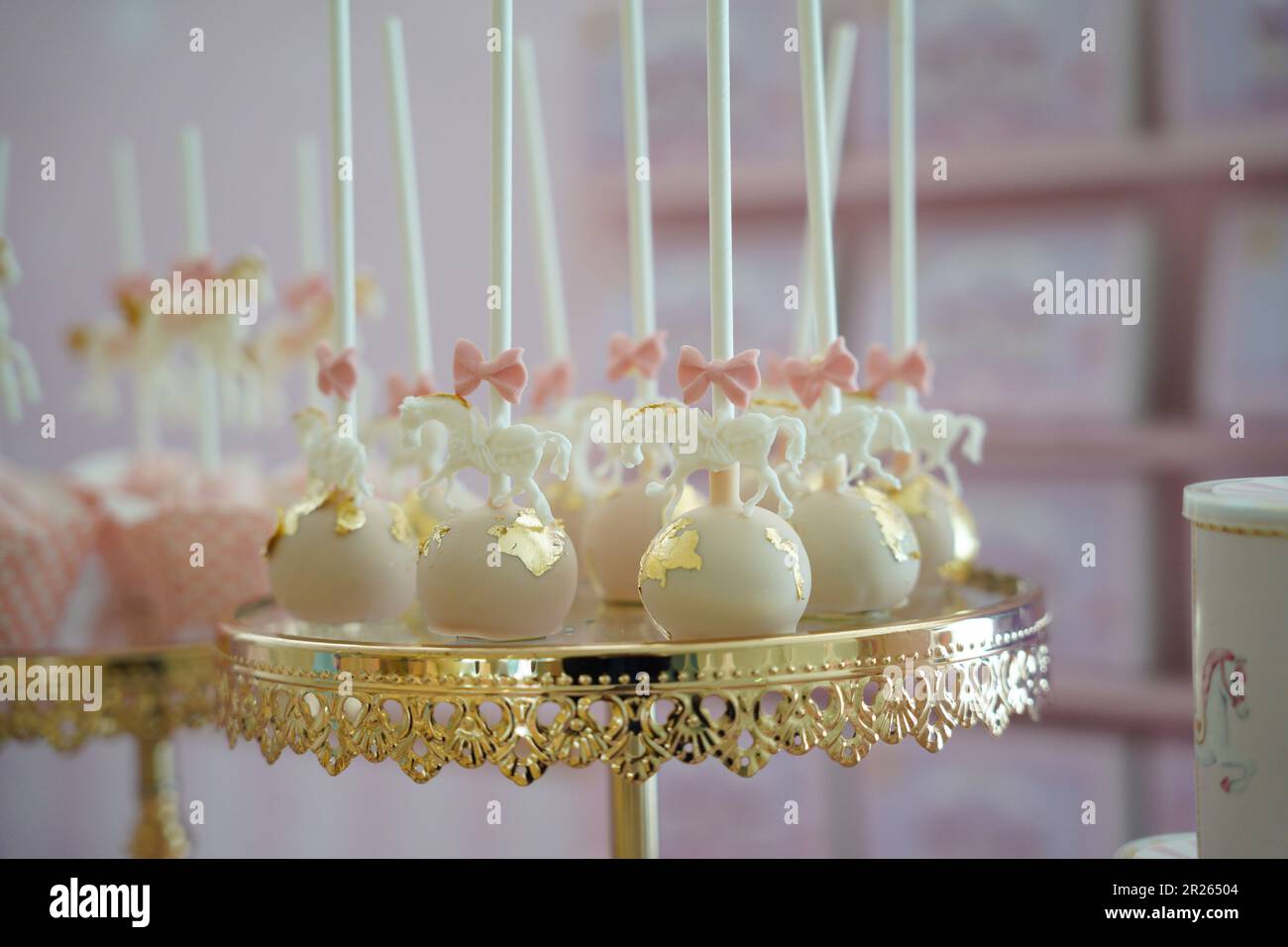 Popcakes with carousel horse carnival theme decoration. A delicate ...