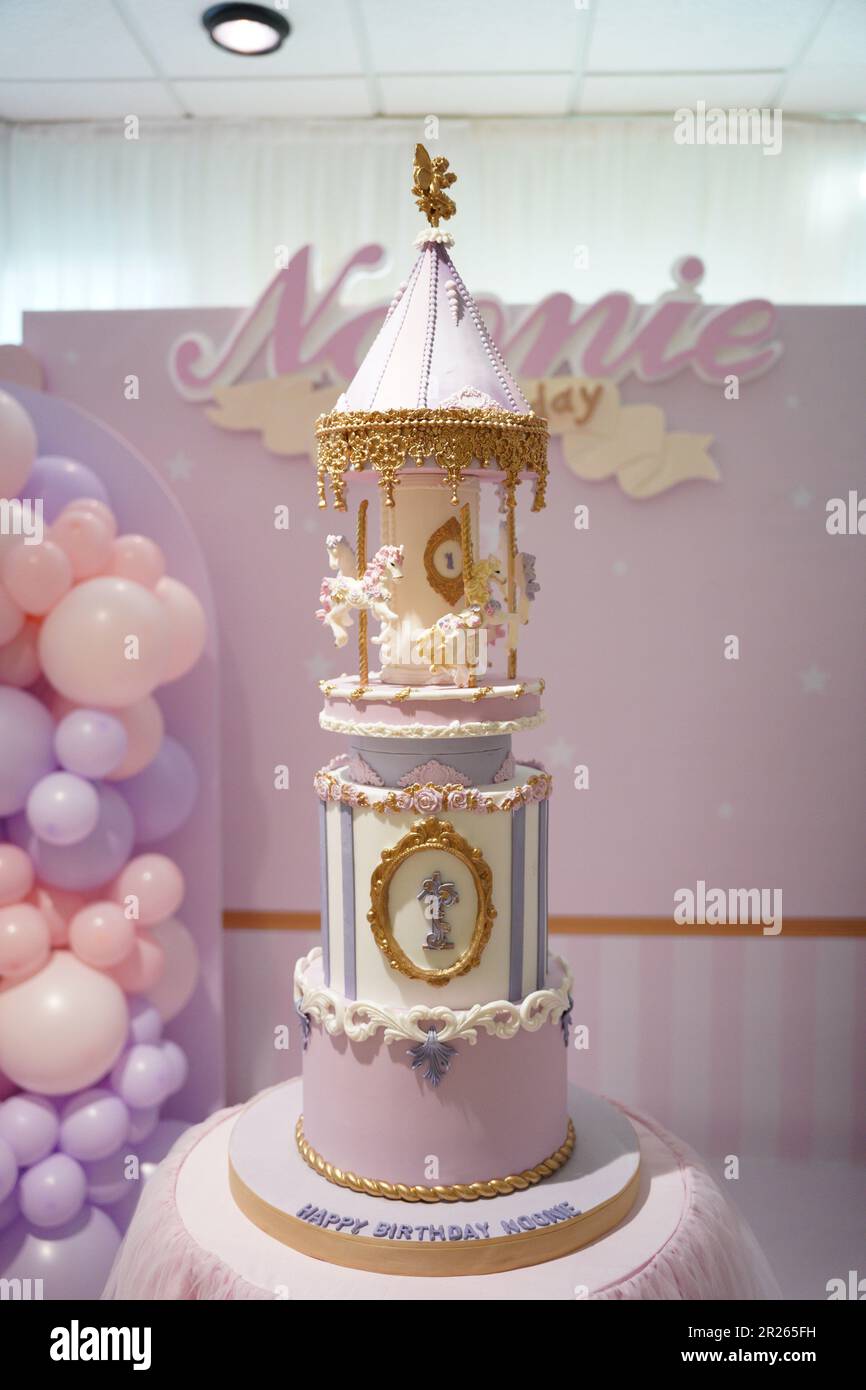 Kids cute birthday cake. Carousel horse birthday cake decorated with ...