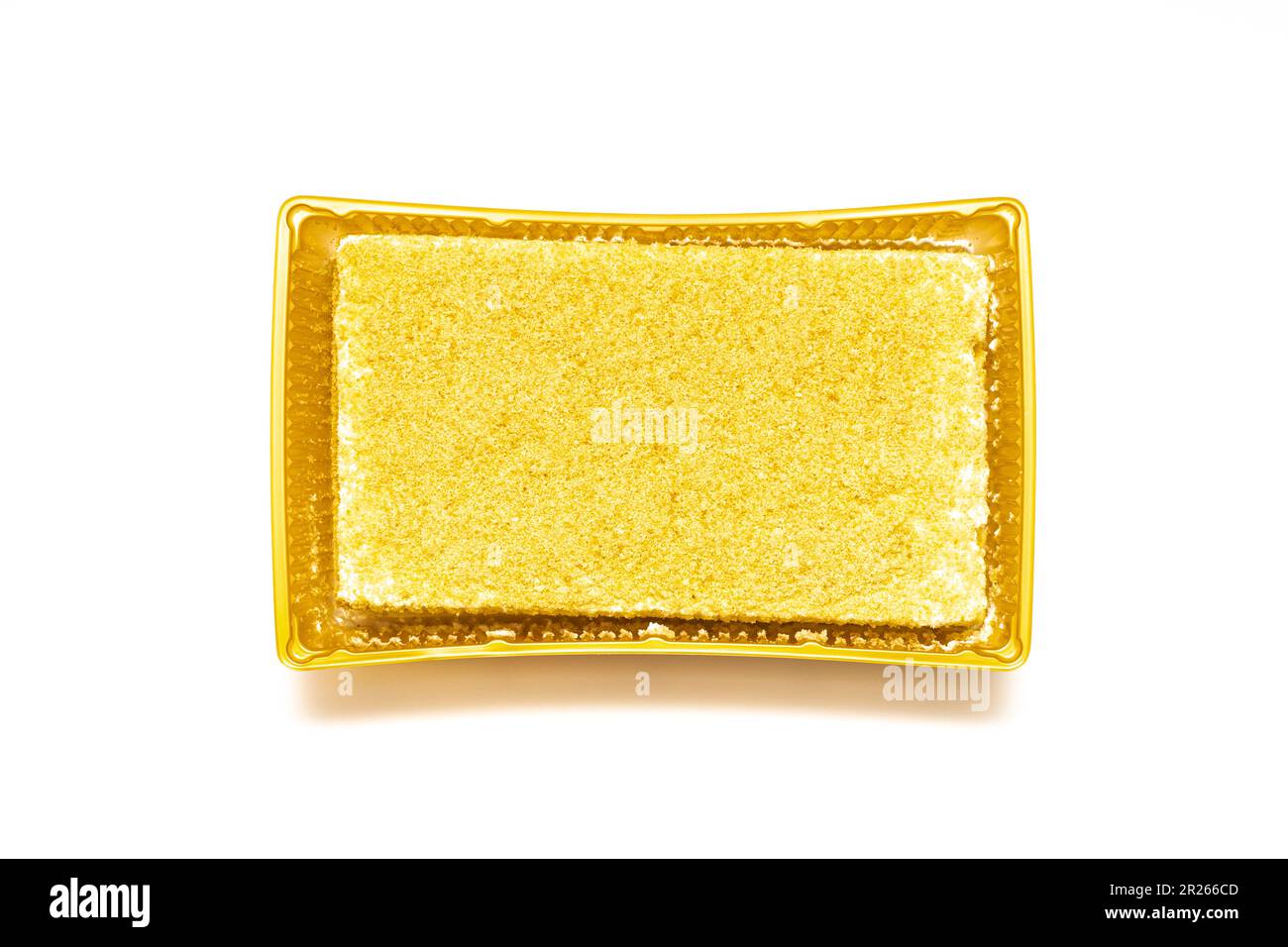 sand cake in a plastic package on a white background. shop cake. yellow ...