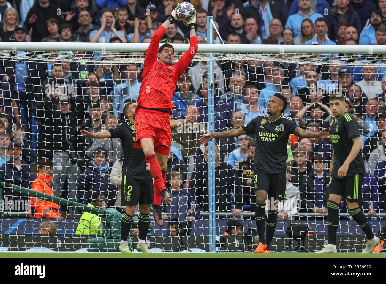 Thibaut Courtois #1 of Real Madrid catches the ball during the UEFA ...