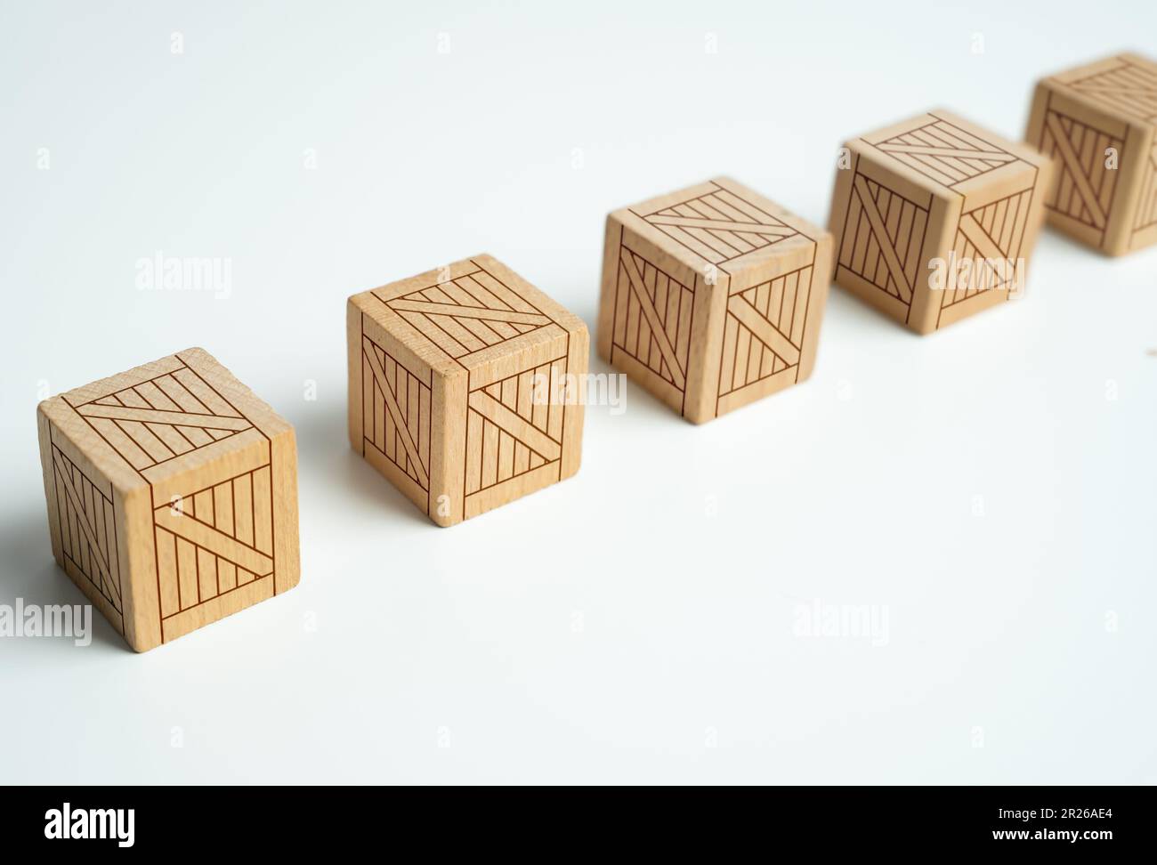 Wooden boxes standing in a row. Production and freight of goods. Neatly ...