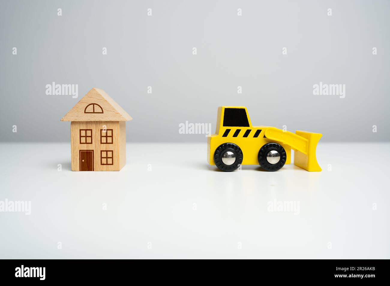 The bulldozer drives away without demolishing the house. Denial of a ...