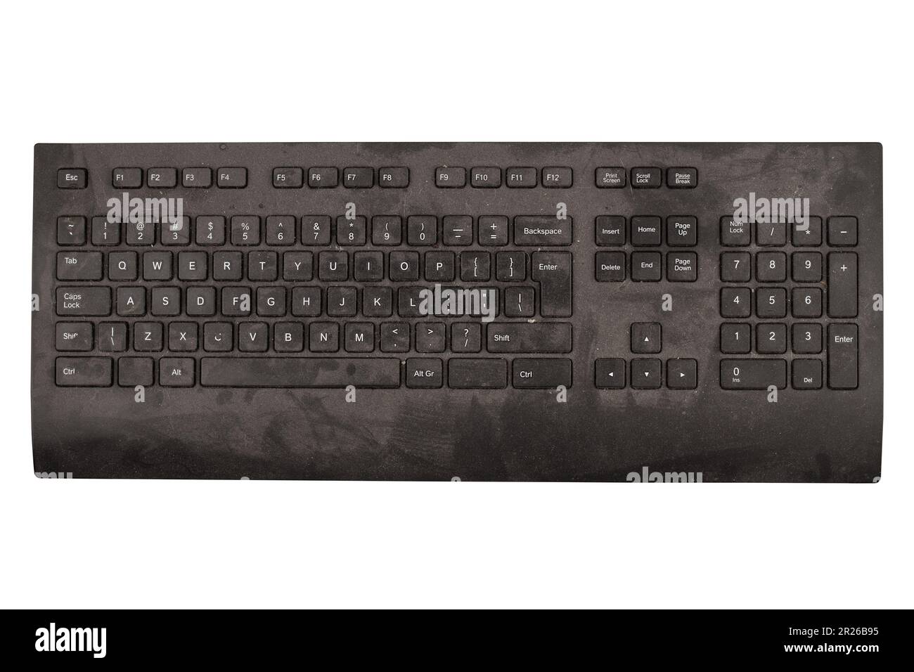 front view closeup of old black keyboard with keys covered in dust and ...