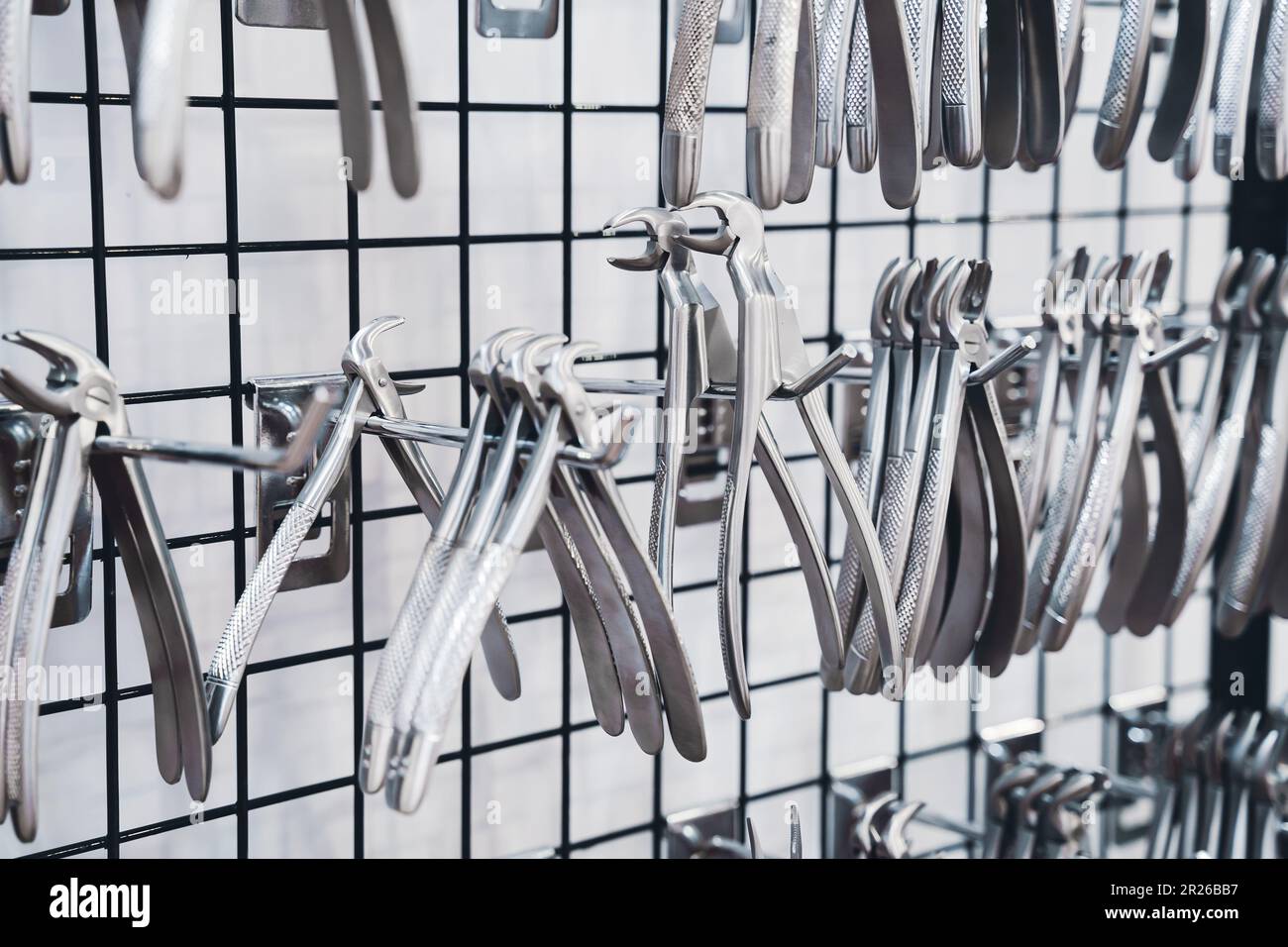 perspective view closeup of row of various stainless steel dental ...
