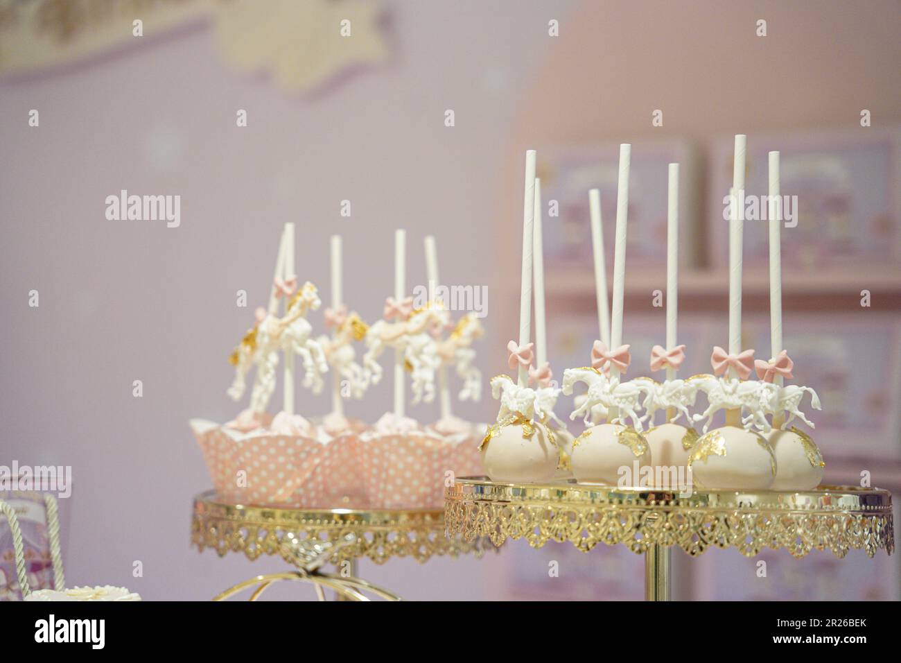 Popcakes with carousel horse carnival theme decoration. A delicate ...