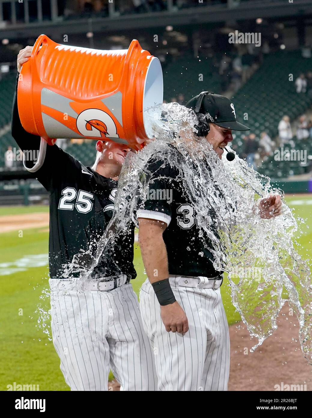 Chicago White Sox's Andrew Vaughn (25) dunks Gavin Sheets with water ...