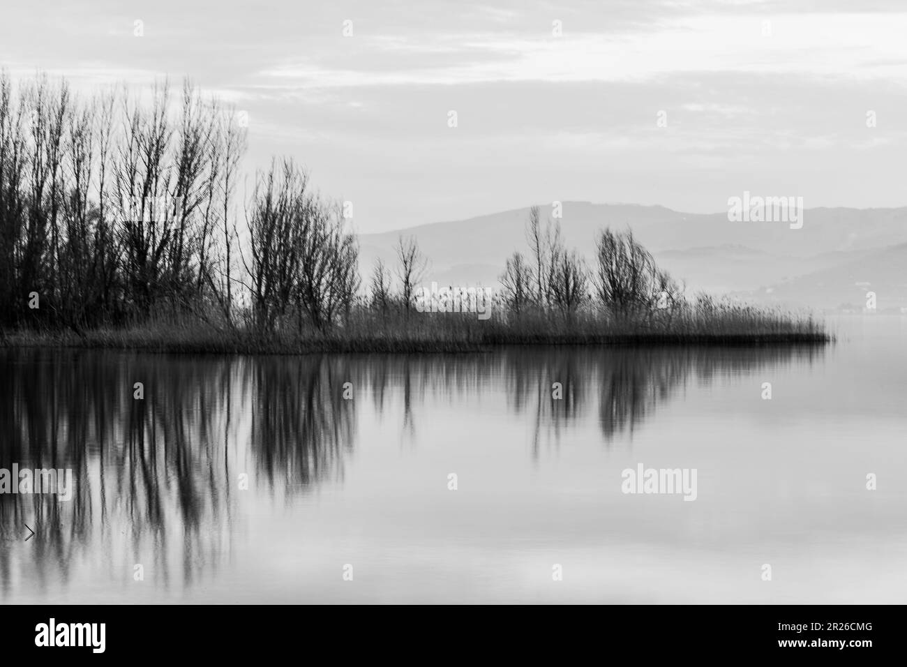 Beautiful sunset clouds reflections on the water Black and White Stock ...