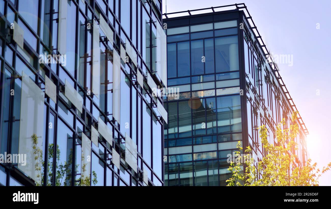 Abstract closeup of the glass-clad facade of a modern building covered ...