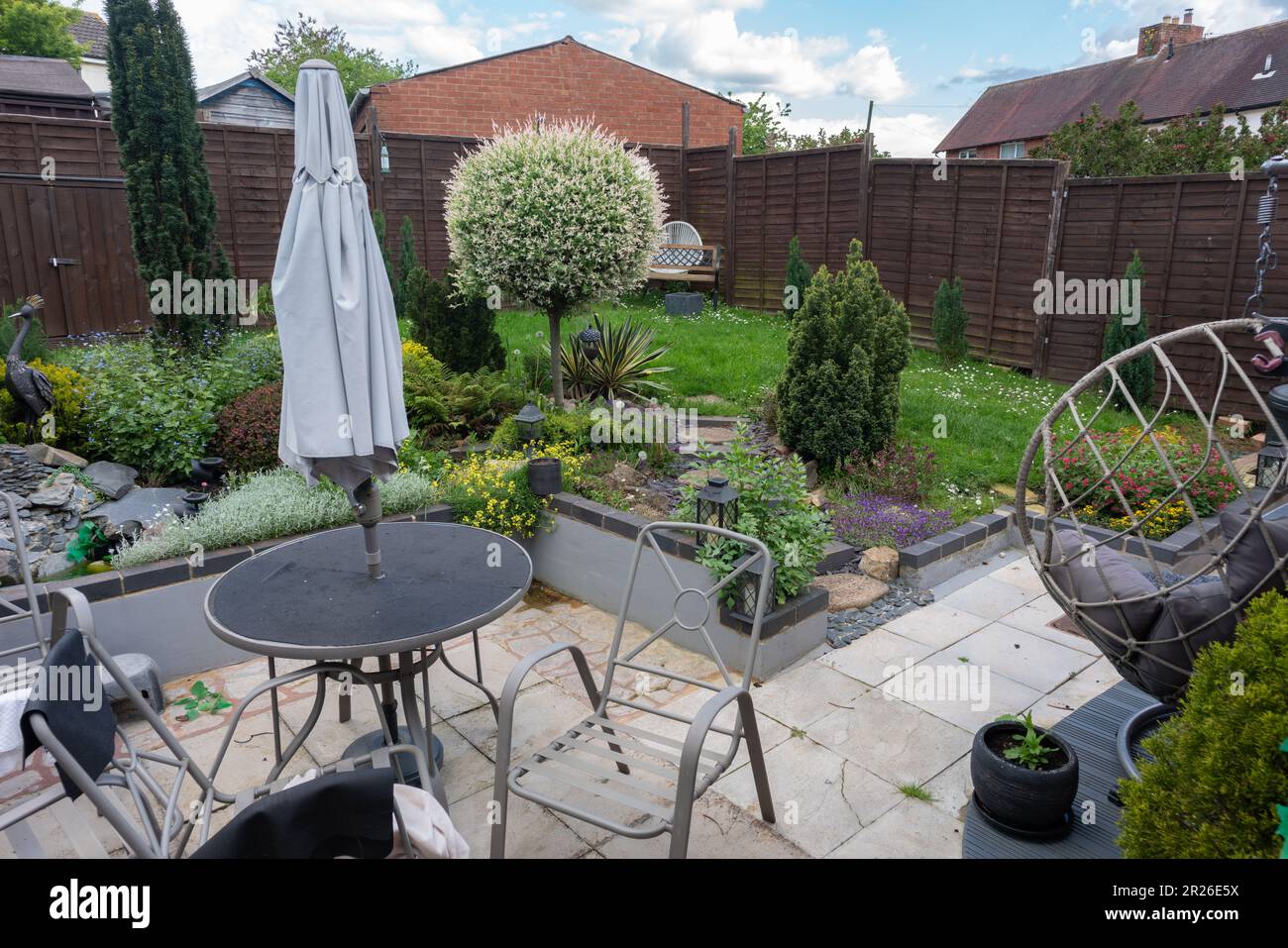 A private residential garden featuring a well-designed landscape ...