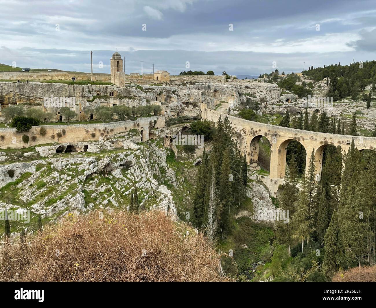 Gravina in Puglia, Italy. View of the ravine, with the cave dwellings ...