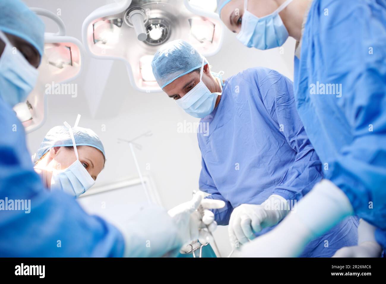 Our team works together to save lives. Low view of medical doctors ...