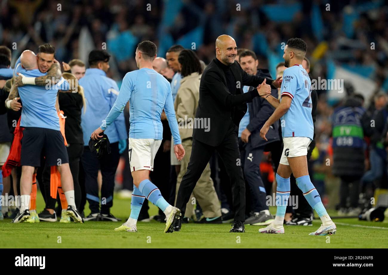 Manchester City manager Pep Guardiola with Riyad Mahrez at full time ...