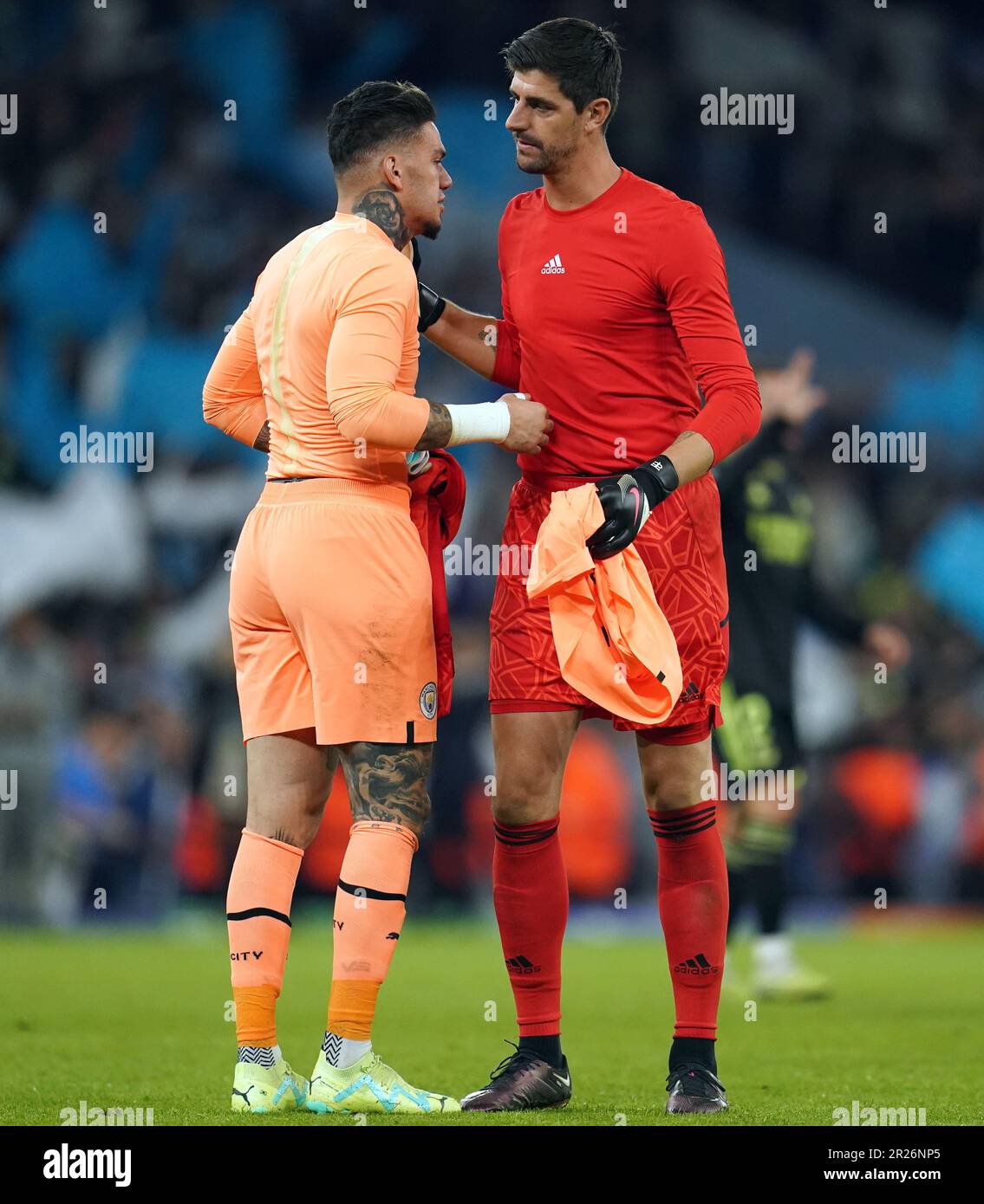Manchester City goalkeeper Ederson with Real Madrid goalkeeper Thibaut ...
