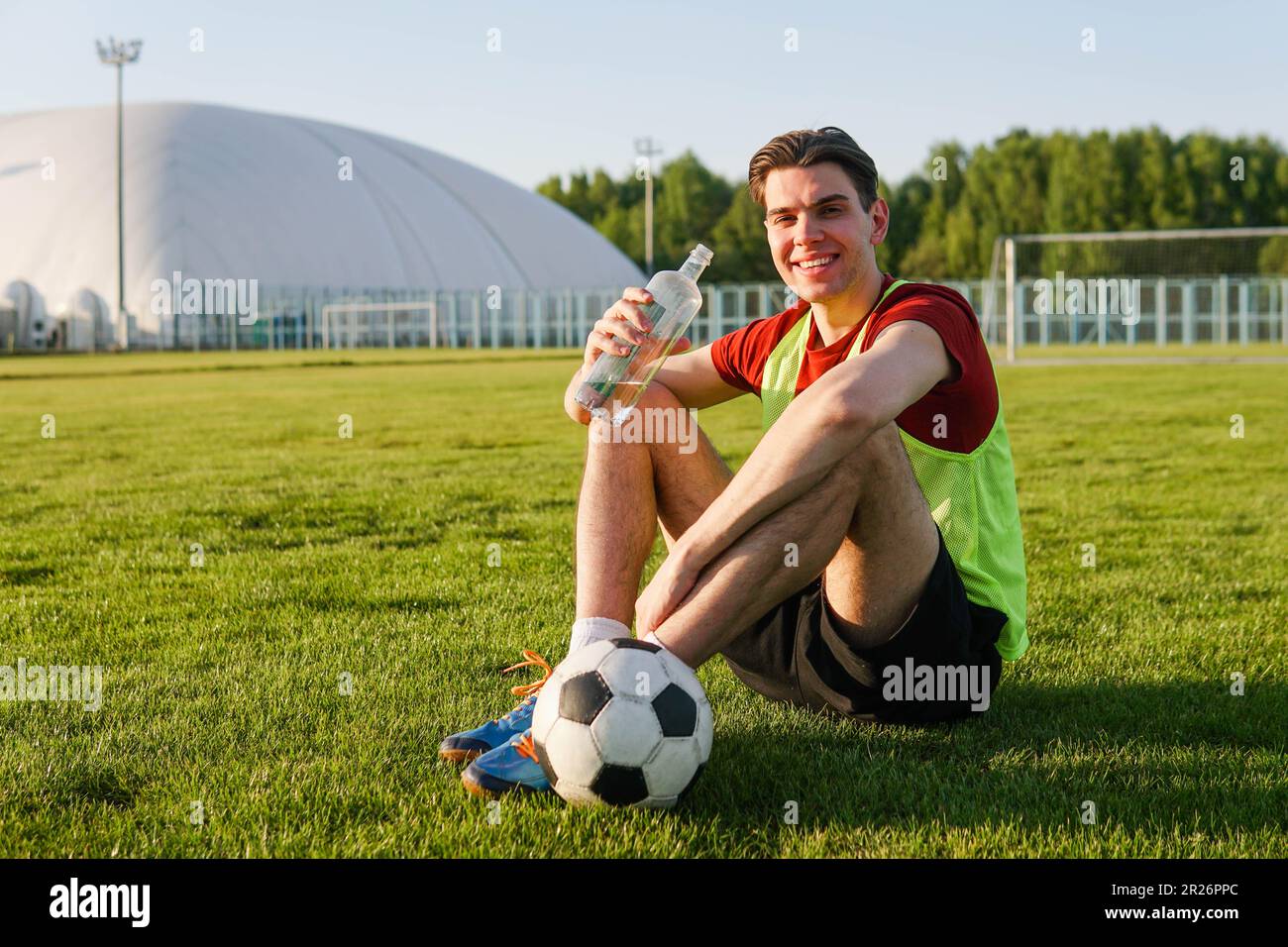 Teenage soccer football player sitting hi-res stock photography and ...