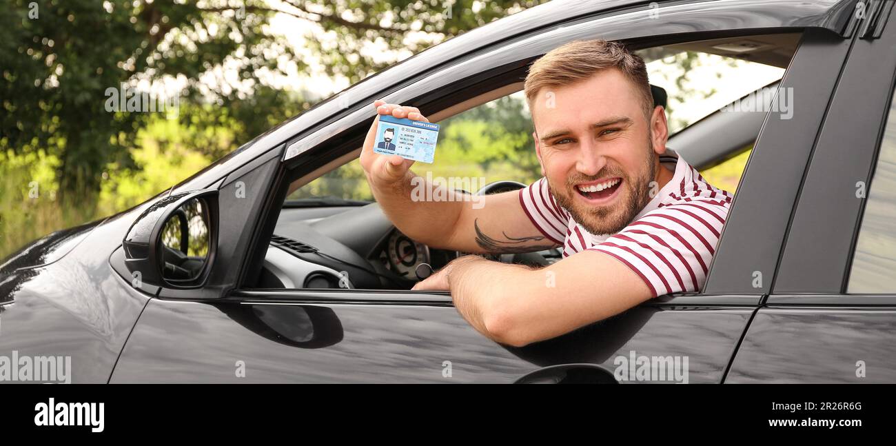 Happy young man after successful passing of driving license test Stock ...