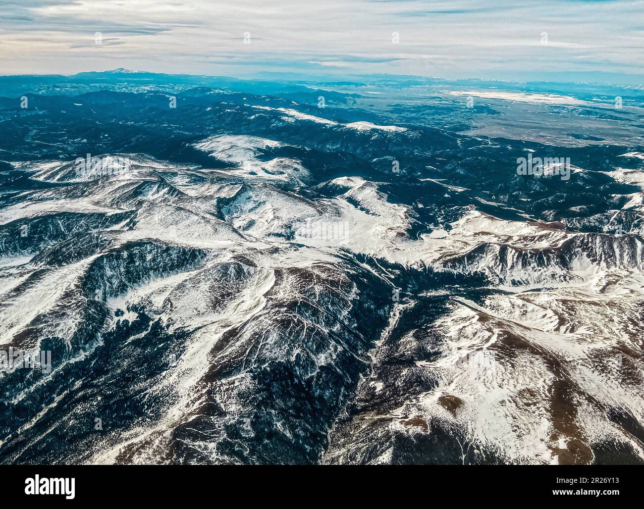 Aerial view of rocky Mountains in winter Stock Photo - Alamy