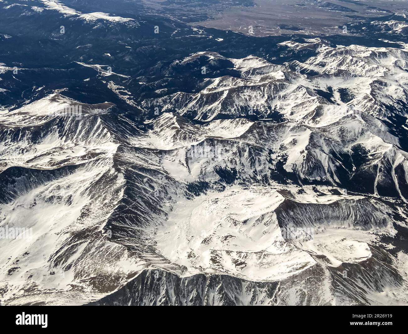 Aerial view of rocky Mountains in winter Stock Photo - Alamy
