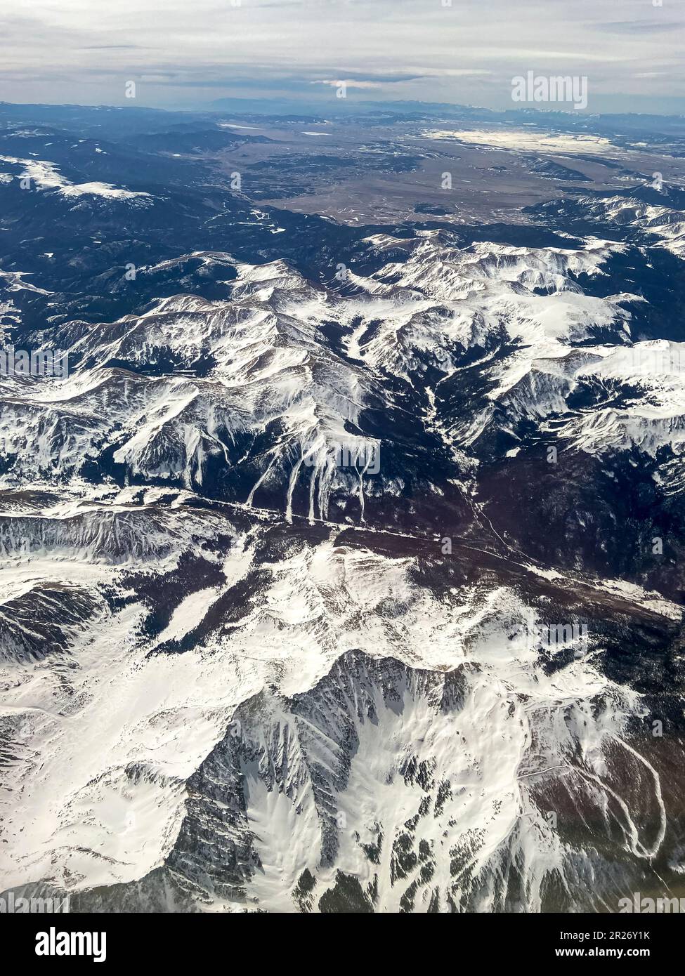 Aerial view of rocky Mountains in winter Stock Photo - Alamy