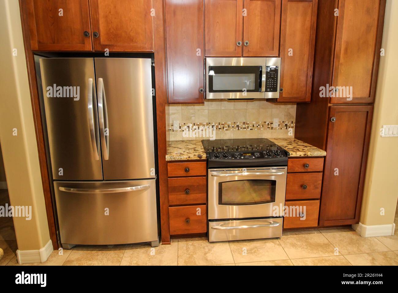 Stainless Steel Appliances In Modern Kitchen Stock Photo - Alamy