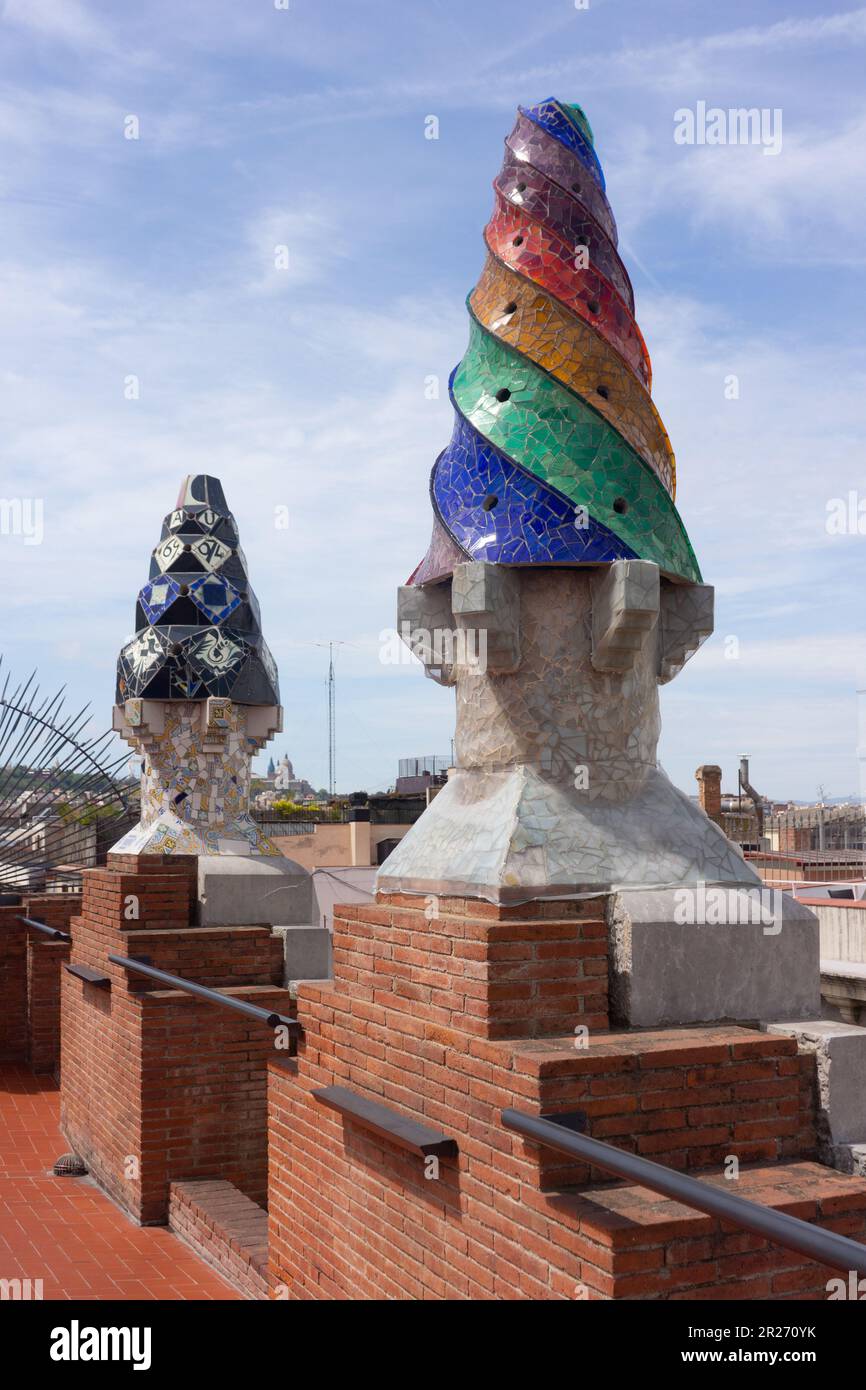 Mosaic chimneys designed by Gaudi on the rooftop of Guell Palace, his ...