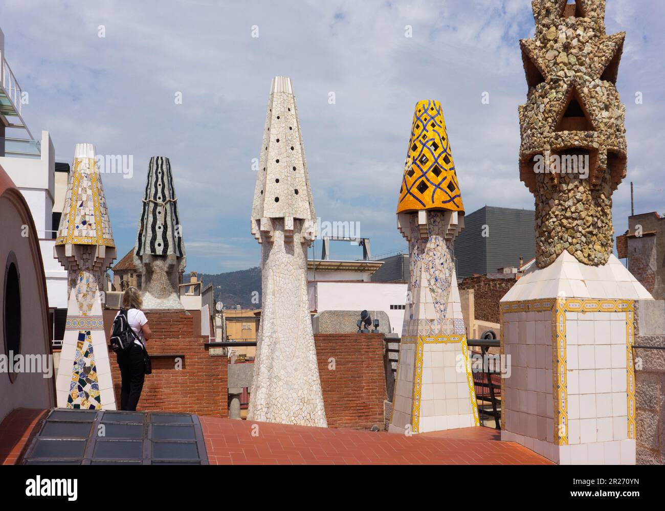Mosaic chimneys designed by Gaudi on the rooftop of Guell Palace, his ...