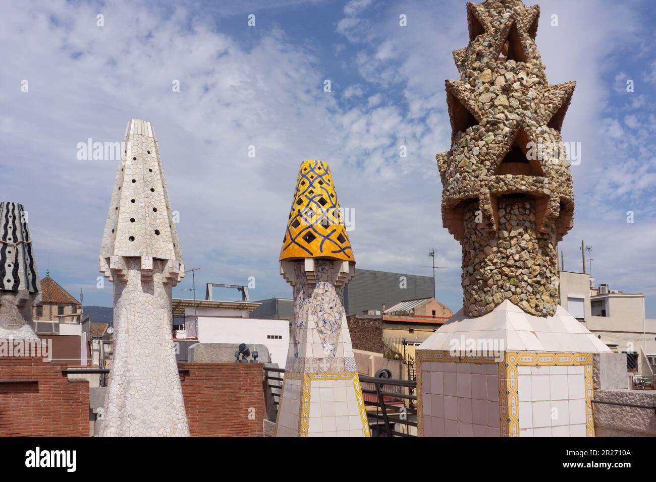 Mosaic chimneys designed by Gaudi on the rooftop of Guell Palace, his ...