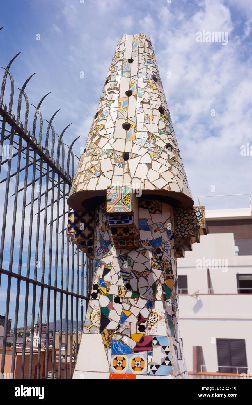 One of many mosaic chimneys designed by Gaudi on the rooftop of Guell ...