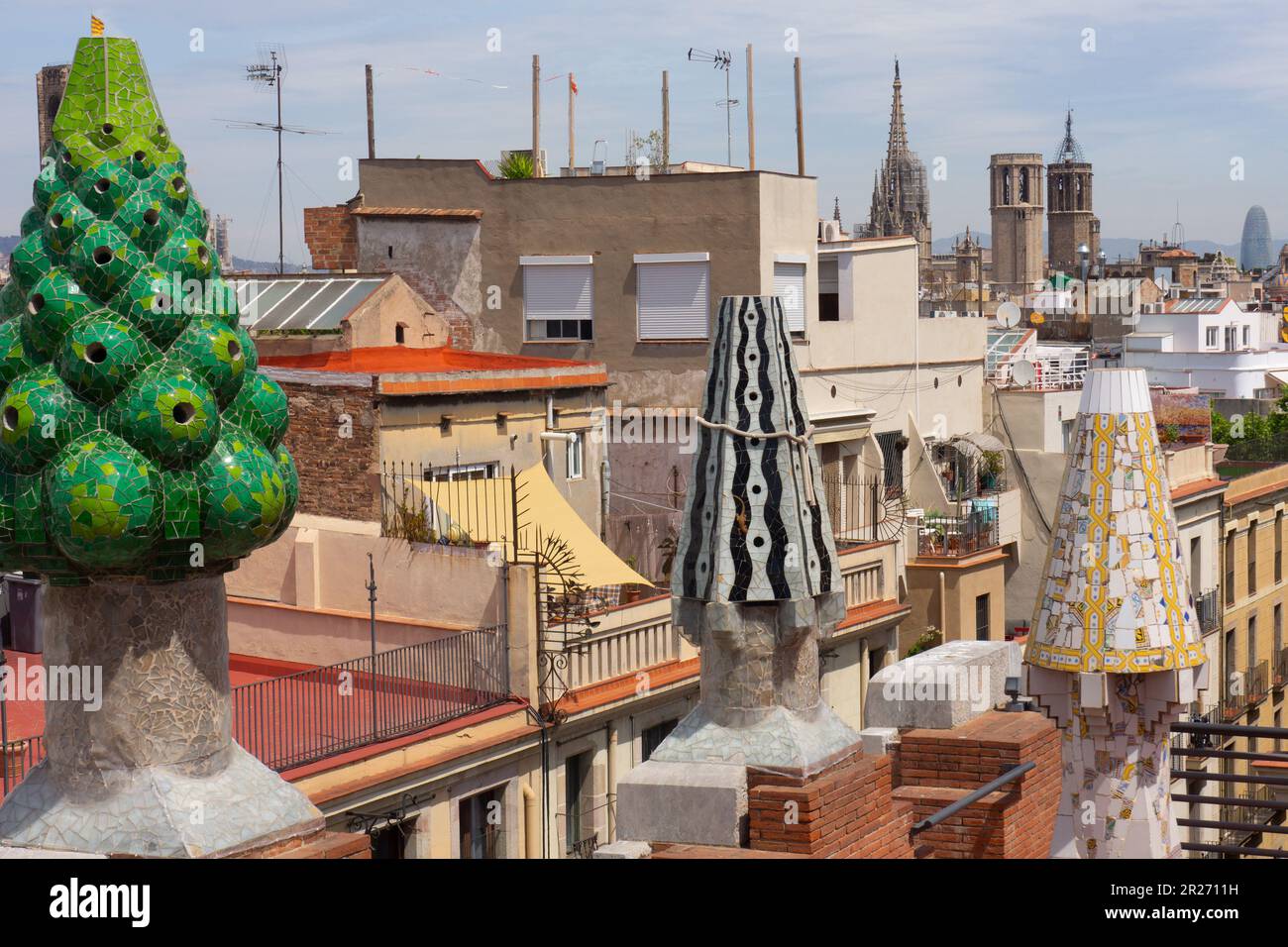 Mosaic chimneys designed by Gaudi on the rooftop of Guell Palace, his ...