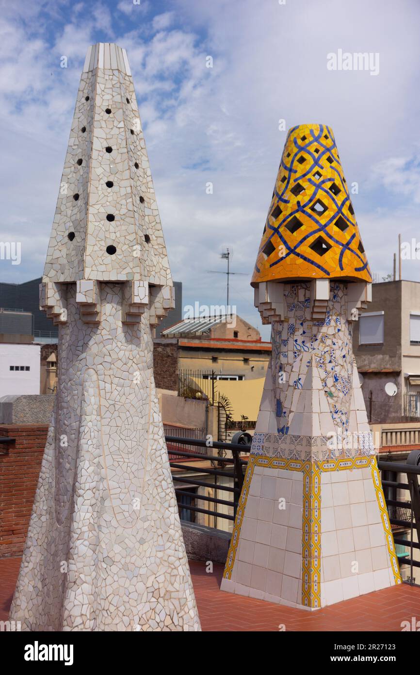 Mosaic chimneys designed by Gaudi on the rooftop of Guell Palace, his ...