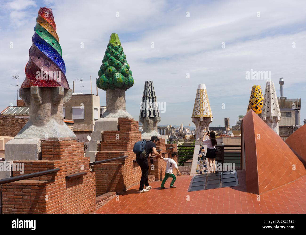 Mosaic chimneys designed by Gaudi on the rooftop of Guell Palace, his ...