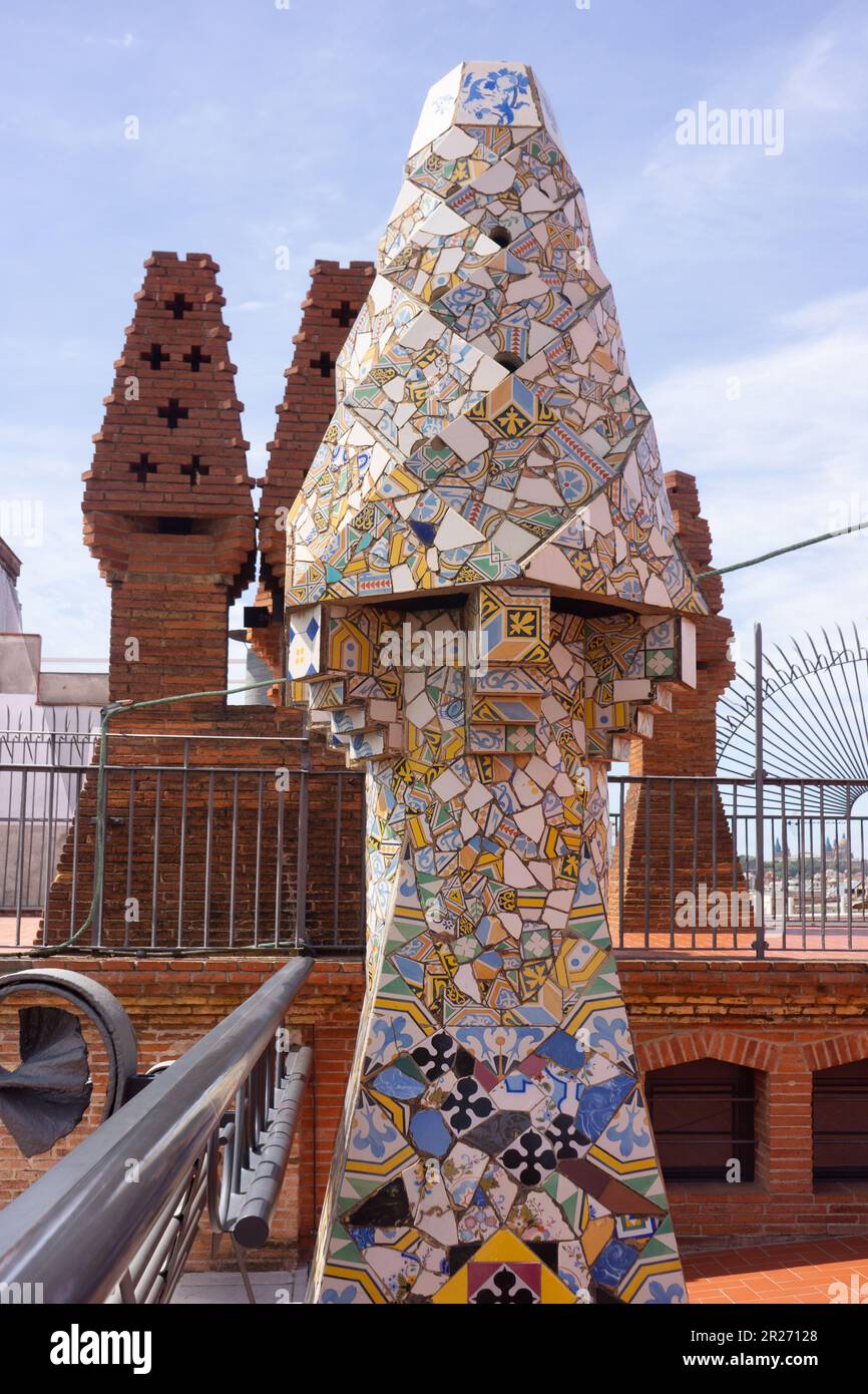 One of many mosaic chimneys designed by Gaudi on the rooftop of Guell ...