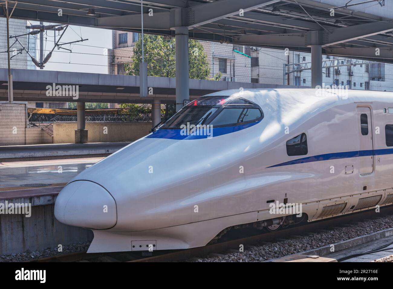 Modern high-speed train stands by the platform. China Stock Photo - Alamy