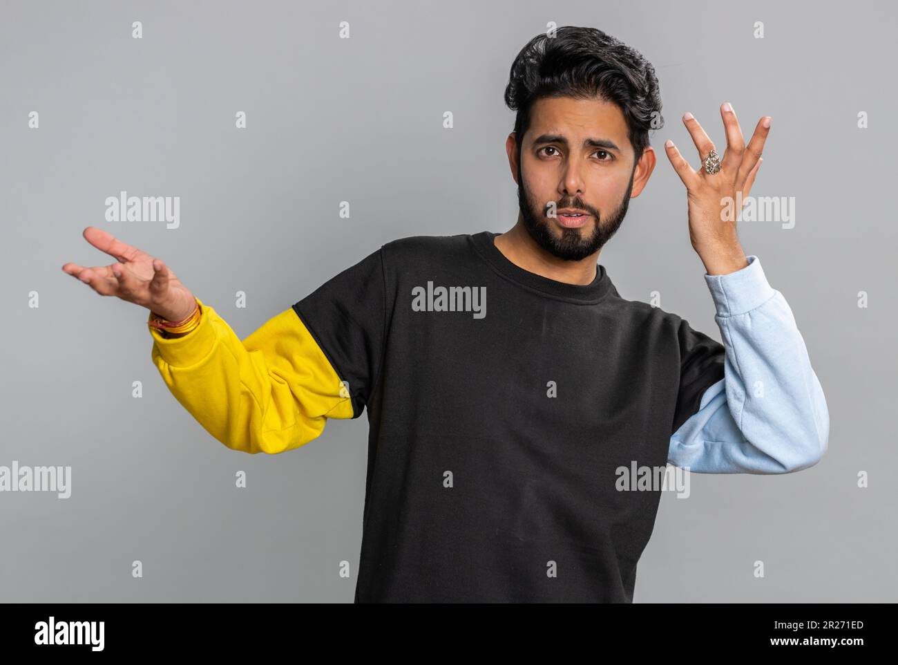 No idea, I dont know answer. Puzzled clueless uncertain indian handsome ...