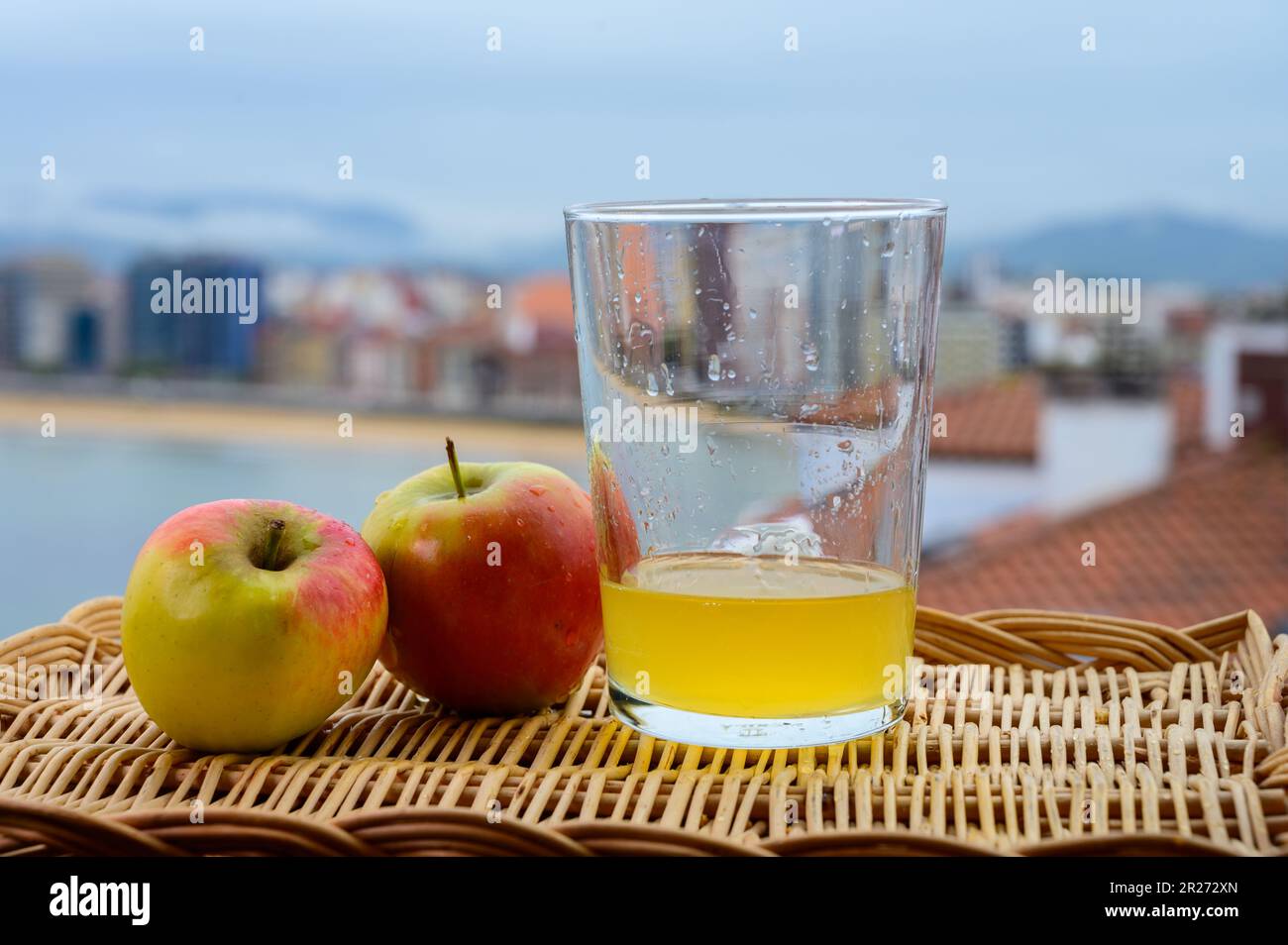 Traditional natural Asturian cider made from fermented apples in wooden ...
