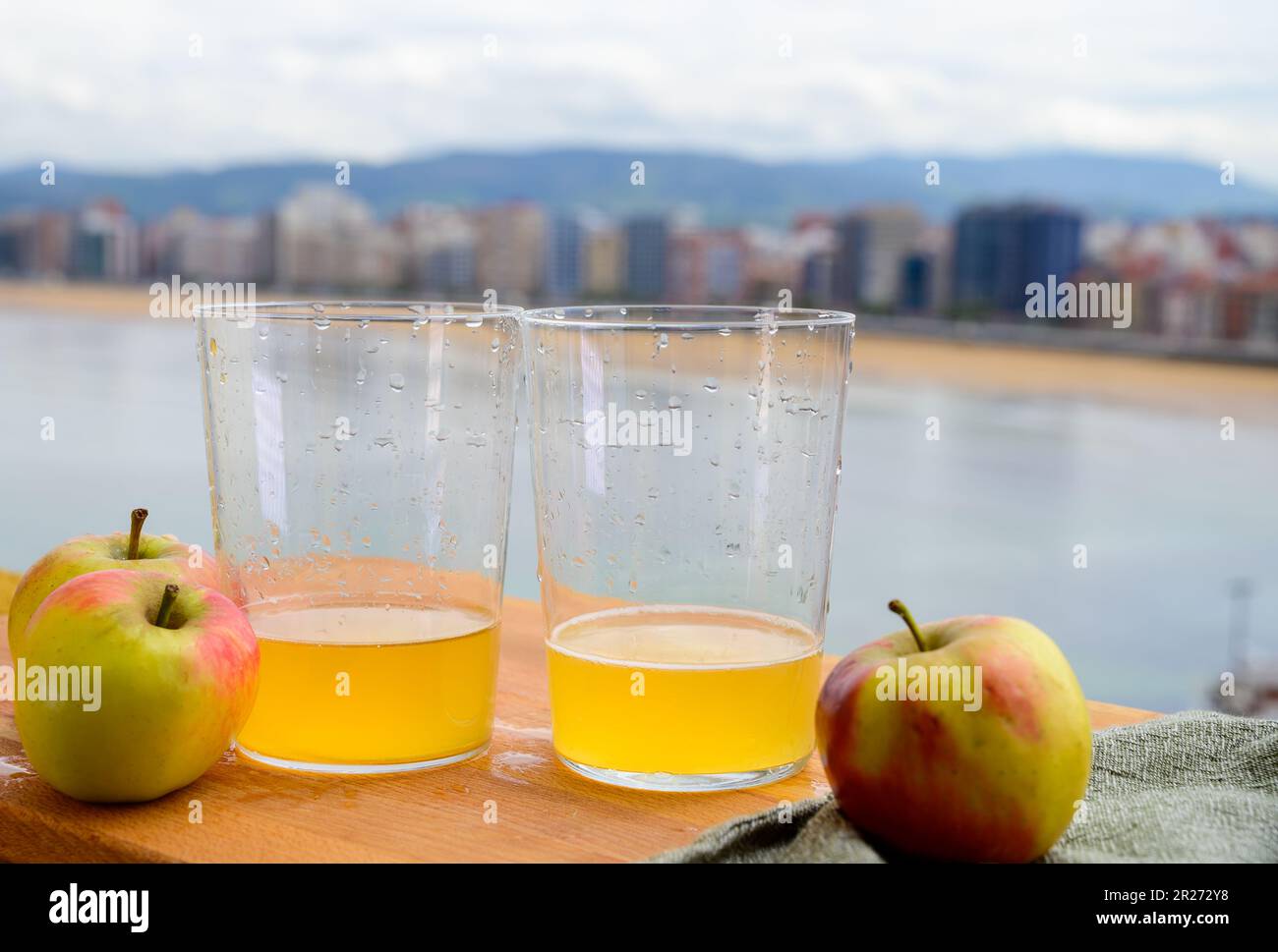Traditional natural Asturian cider made from fermented apples in wooden ...